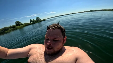 man falling down out of balance board | Stock Video | Pond5