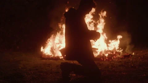 A Man Falling to His Knees in Front of a... | Stock Video | Pond5