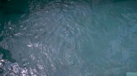Man falling into a swimming pool and flo... | Stock Video | Pond5