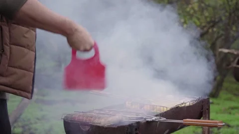 Fanning The Flames Stock Footage ~ Royalty Free Stock Videos | Pond5