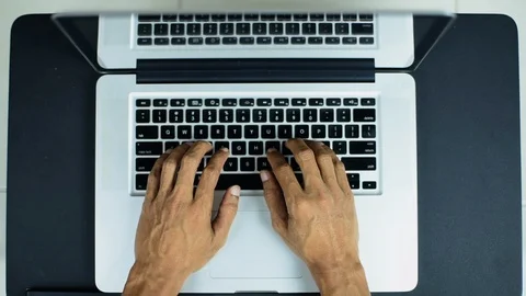 Man finish working and closing computer ... | Stock Video | Pond5