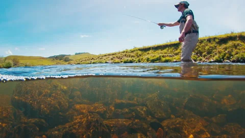 Man fly fishing on the river. Angler sta... | Stock Video | Pond5