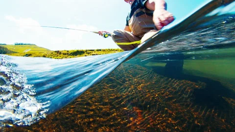 Man fly fishing on the river. Angler sta... | Stock Video | Pond5