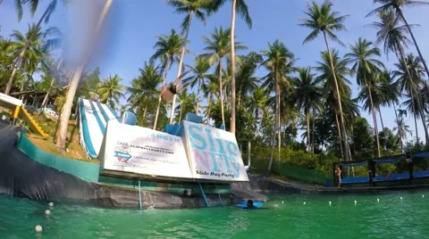 Man Flying in Extreme Water Slides in Wa... | Stock Video | Pond5