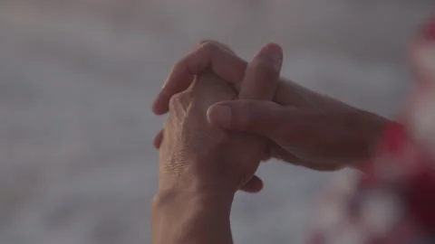 Man Folding Hands At Beach | Stock Video | Pond5