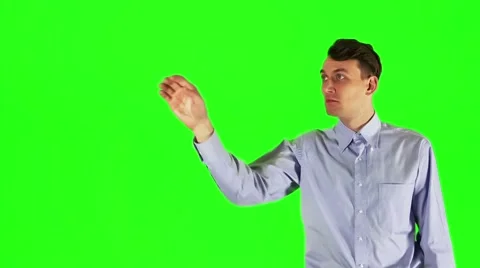 Man in front of a green screen with vari... | Stock Video | Pond5