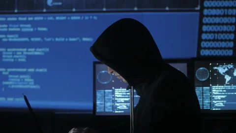 Man geek hacker in hood working at compu... | Stock Video | Pond5