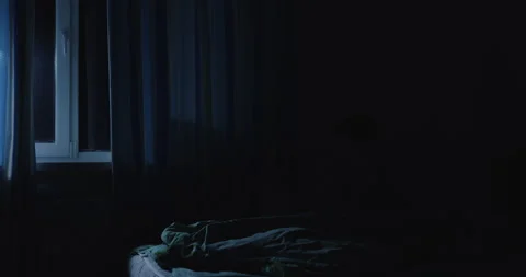Man goes to bed by moonlight, sleeping n... | Stock Video | Pond5
