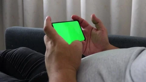 Man with Green Screen Chroma Key Smartph... | Stock Video | Pond5