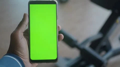 man hand holding green screen smart phon... | Stock Video | Pond5