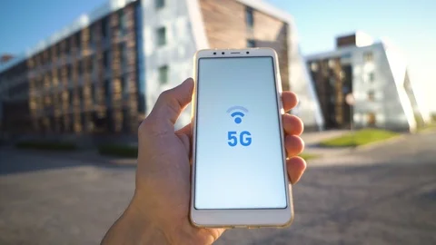 man hand holding a smartphone and 5g sig... | Stock Video | Pond5