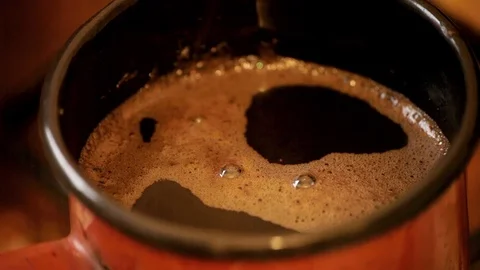 Man Hand Mixing Coffee Scum Kettle | Stock Video | Pond5
