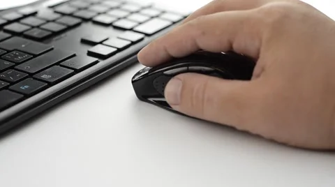 Man hand move to the PC mouse and use PC... | Stock Video | Pond5