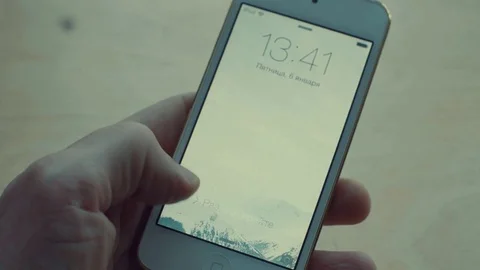 Man hand scrolling photos in smartphone.... | Stock Video | Pond5