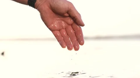 Man hand is touching water. Clean ocean.... | Stock Video | Pond5