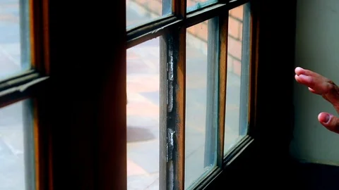 man hand touching a window. | Stock Video | Pond5
