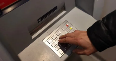 Man hand typing pin code on ATM keyboard... | Stock Video | Pond5