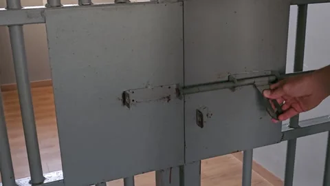 Man Hands Lock Latch Slide Barrel to Clo... | Stock Video | Pond5