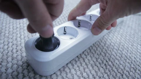 Man hands turn off and unplug wires from... | Stock Video | Pond5