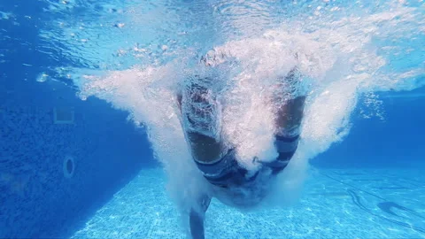 Man head jump in swimming pool, underwat... | Stock Video | Pond5