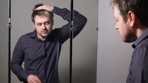 A man with a high forehead and receding ... | Stock Video | Pond5