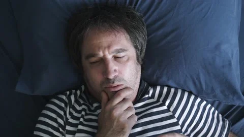 Man In His Bed Thinking Deeply Lying Dow... | Stock Video | Pond5