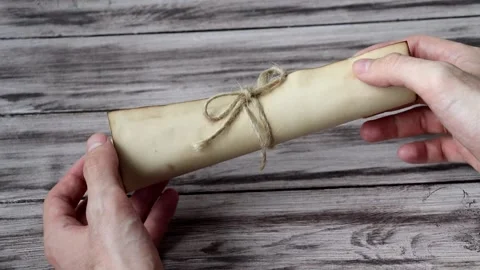 Man is holding an ancient scroll. Mediev... | Stock Video | Pond5