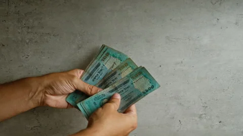 Man holding bangladeshi taka notes again... | Stock Video | Pond5