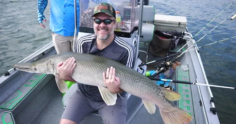 Man Holding His Alligator Gar Fish Catch | Stock Video | Pond5