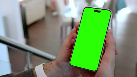 Man Holding iPhone Pro, Close Up Screen ... | Stock Video | Pond5
