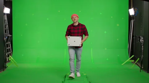 man holding a rectangular poster with ma... | Stock Video | Pond5