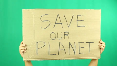 Man holding a sign Save our planet word... | Stock Video | Pond5