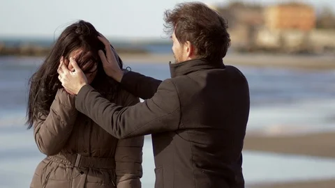 Man hugging sad woman crying slow motion | Stock Video | Pond5