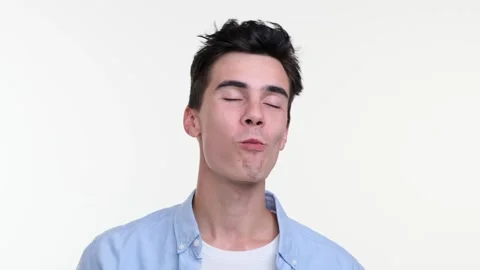 Man Indulging in Pastry Delight on White... | Stock Video | Pond5