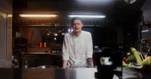 A man in an industrial kitchen | Stock Video | Pond5