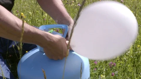 Balloon Inflate Helium Stock Videos – Royalty-Free HD & 4K Videos | Pond5
