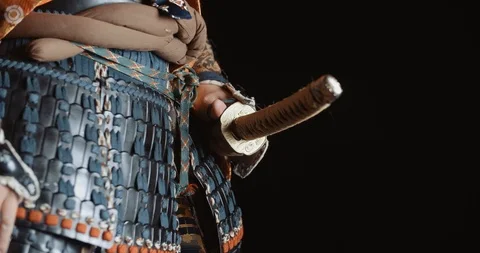 A man in japanese samurai armour is taki... | Stock Video | Pond5
