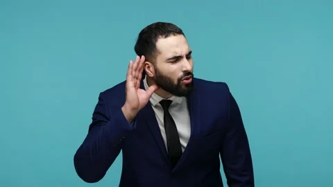 Man keeping hand near ear listening care... | Stock Video | Pond5