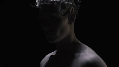 Man with laurel wreath on his head, look... | Stock Video | Pond5