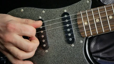 Man lead guitarist playing electrical gu... | Stock Video | Pond5