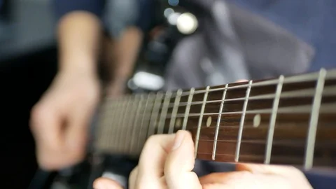 Man lead guitarist playing electrical gu... | Stock Video | Pond5