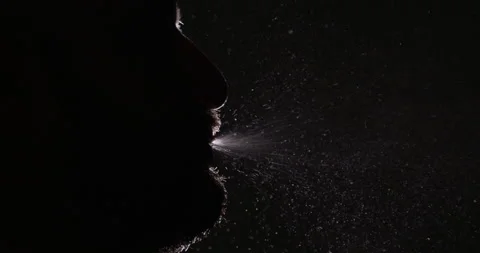 Man lets saliva out of his mouth on a bl... | Stock Video | Pond5