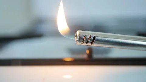 A Man Lighting Up Fire at Gas Cooker wit... | Stock Video | Pond5