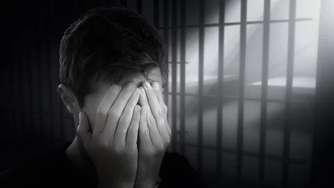 Man Locked Up Crying In Prison | Stock Video | Pond5