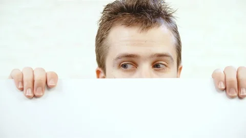 Man look over wall in slow motion 4K | Stock Video | Pond5