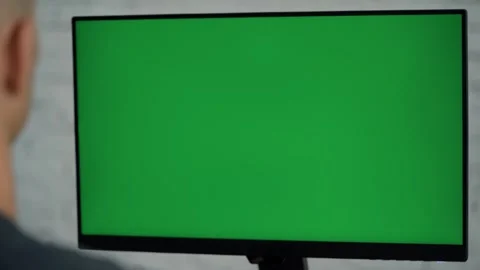 Man Looking at Green Screen Desktop Comp... | Stock Video | Pond5