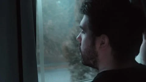 Man Looking Out Window Rain Stock Videos – Royalty-Free HD & 4K Videos