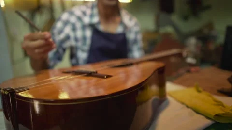 Man Lute Maker Artisan Tuning Guitar Wit... | Stock Video | Pond5