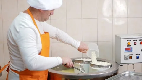 man makes cheese, curd mass, fermentatio... | Stock Video | Pond5