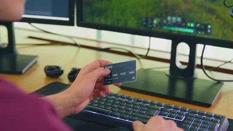 Man Making In Game Purchase Using Credit... | Stock Video | Pond5